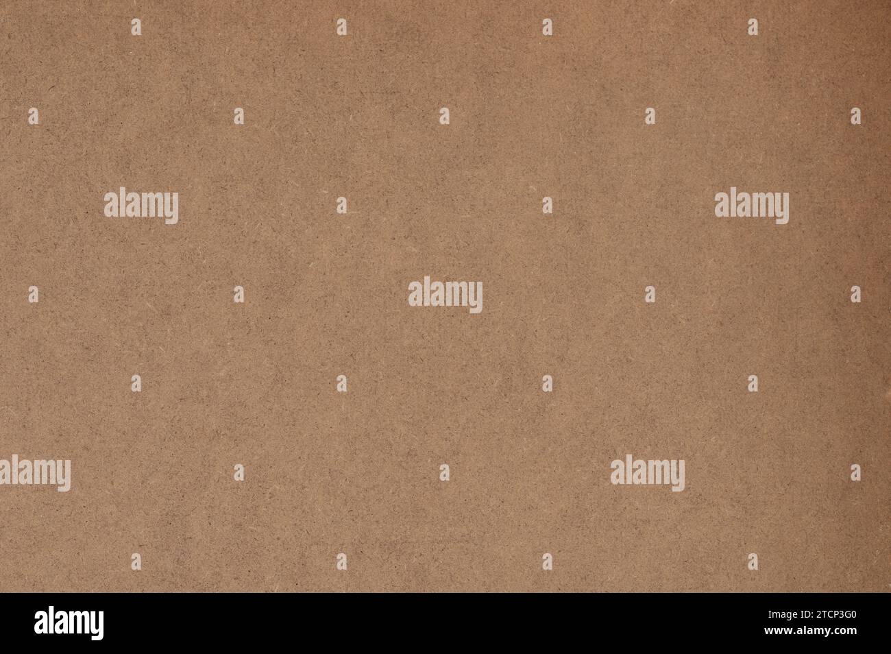 Compressed wooden hardboard brown texture background close up view ...