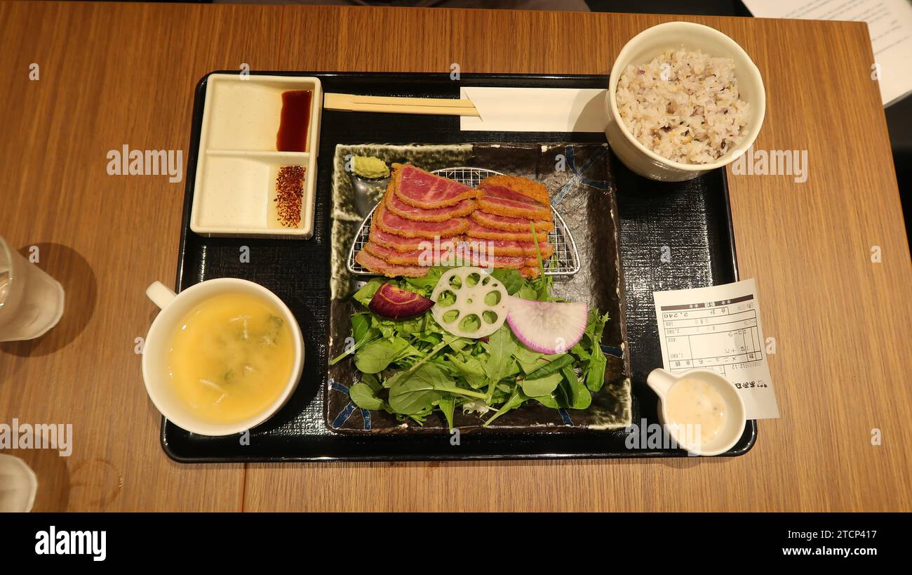 various images from a trip to Tokyo and hiroshima featuring food ...