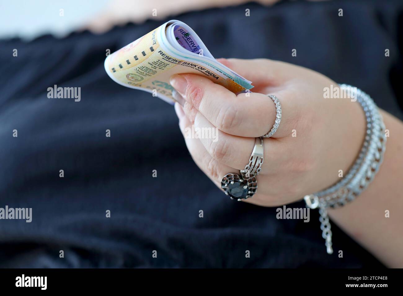 Woman hand with indian rupees bills close up. Concept of financial ...