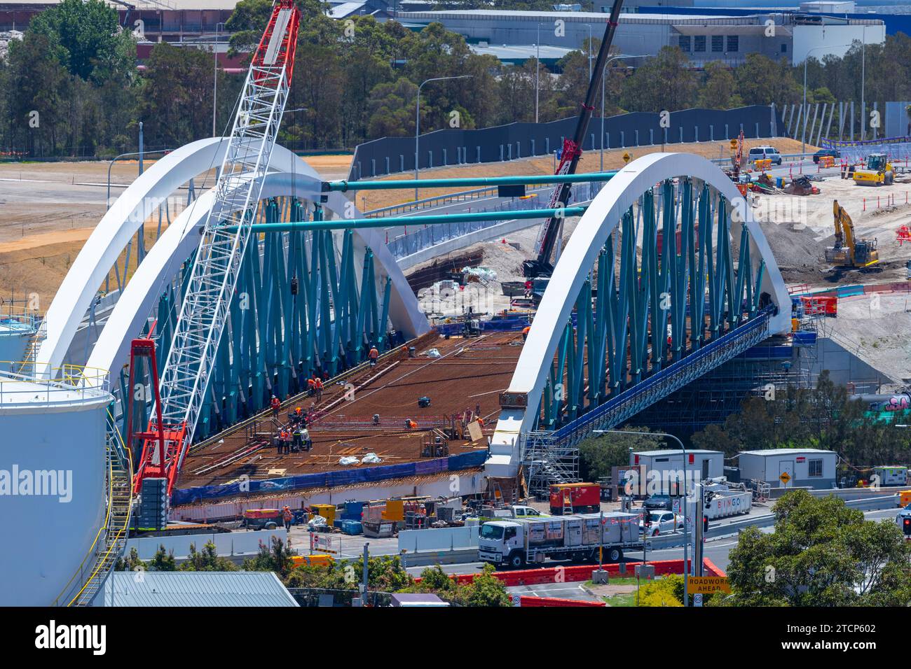 Workers constructing the new West Bridge over Alexandra Canal in Sydney ...