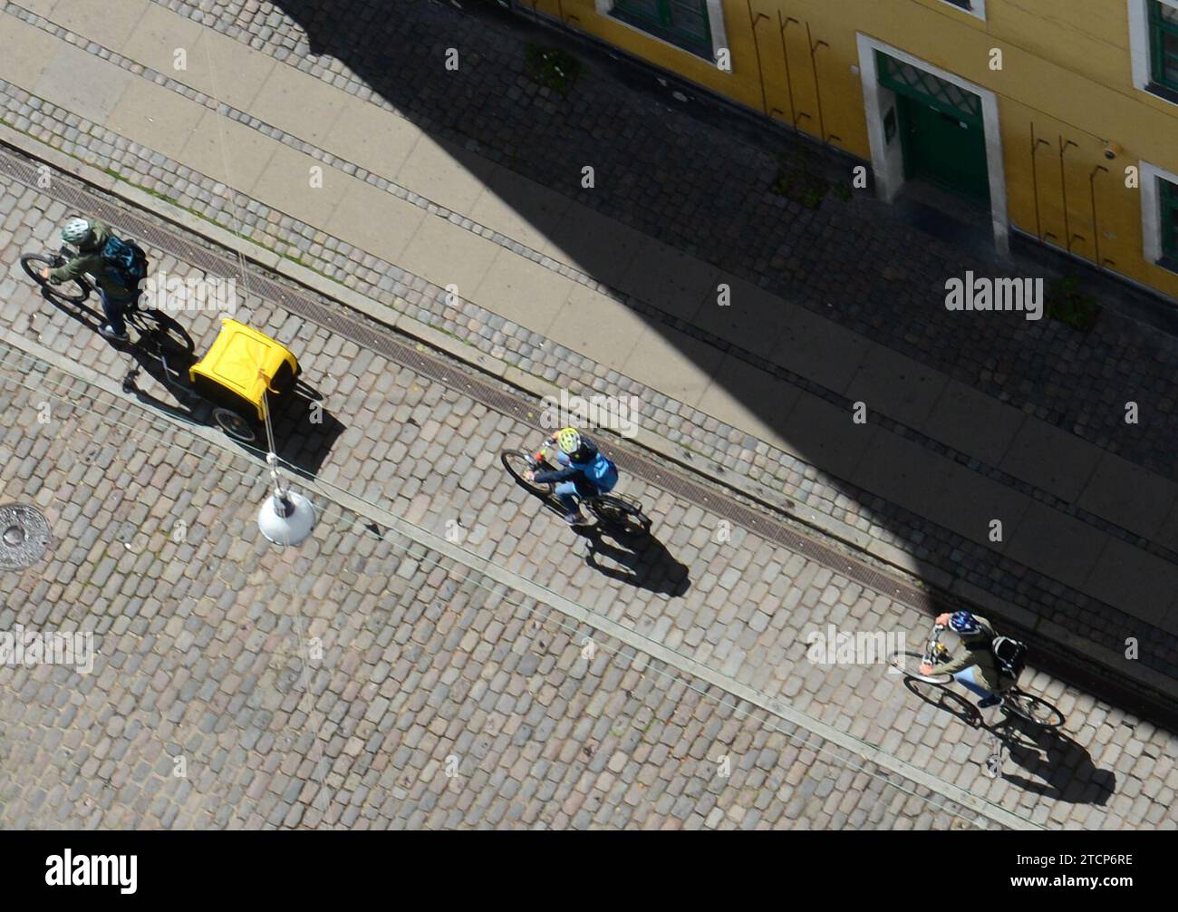 Aerial view of bicycle riders in Freetown Christiania, Copenhagen ...