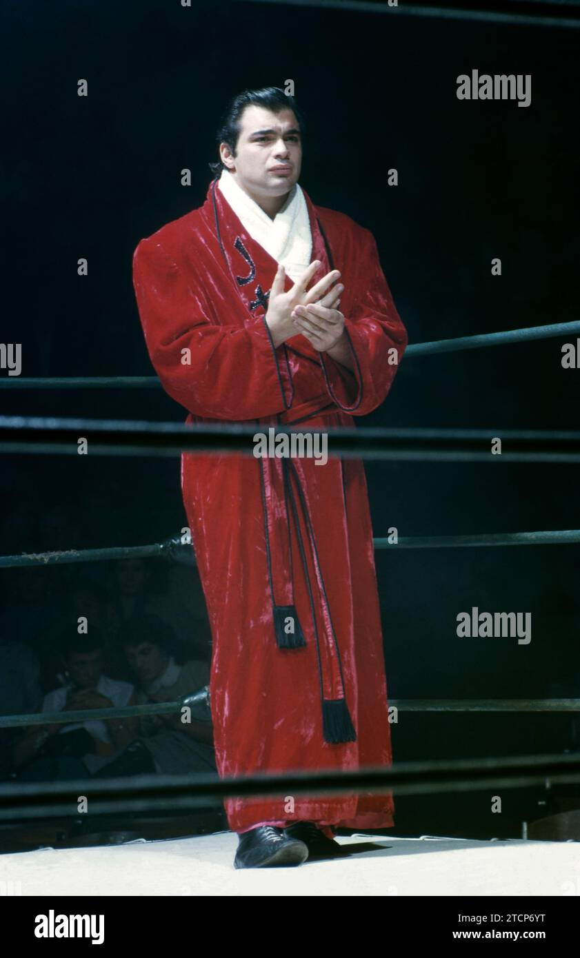NOVEMBER, 1954: An unidentified profressional wrestler is introduced ...