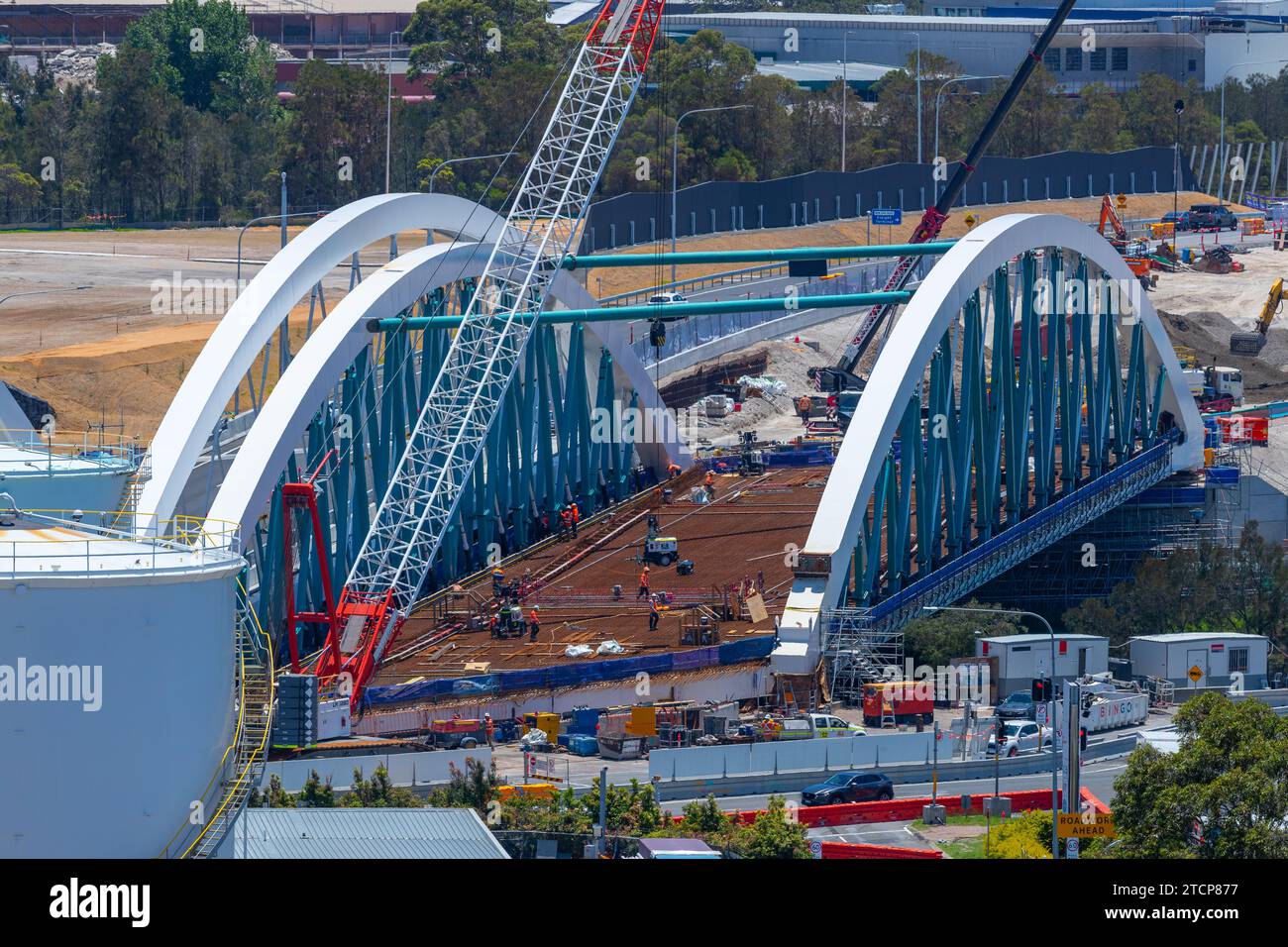 Workers constructing the new West Bridge over Alexandra Canal in Sydney ...