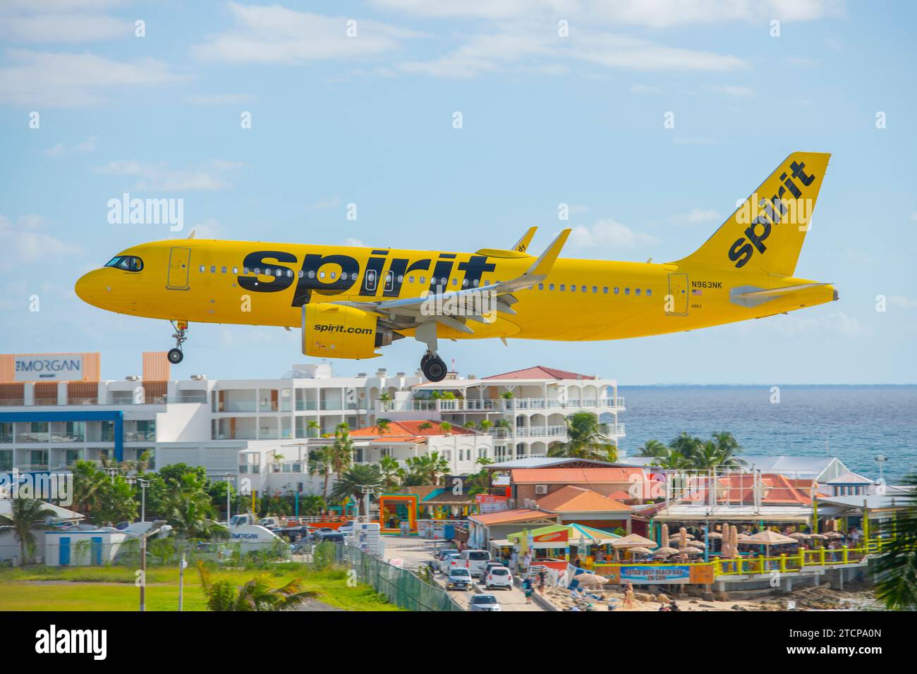 Spirit Airlines Airbus 320 flying over Maho Beach before landing on ...