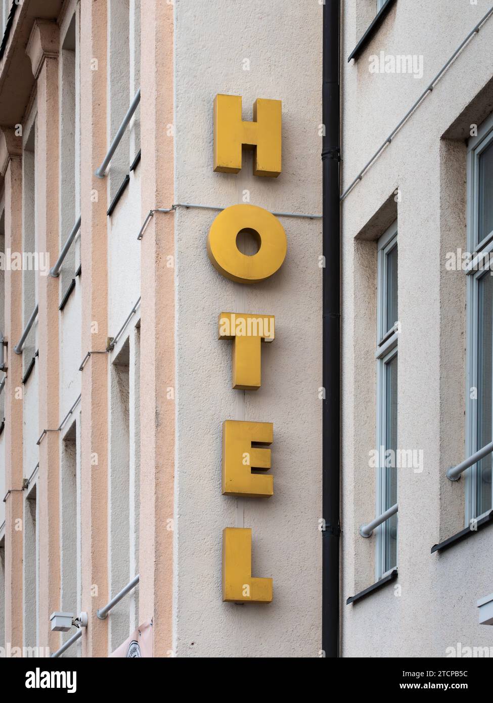 Hotel sign on a building exterior. The symbol advertises for an ...