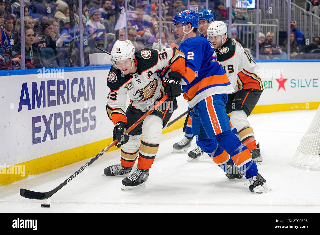 New York Islanders defenseman Mike Reilly (2) checks Anaheim Ducks ...
