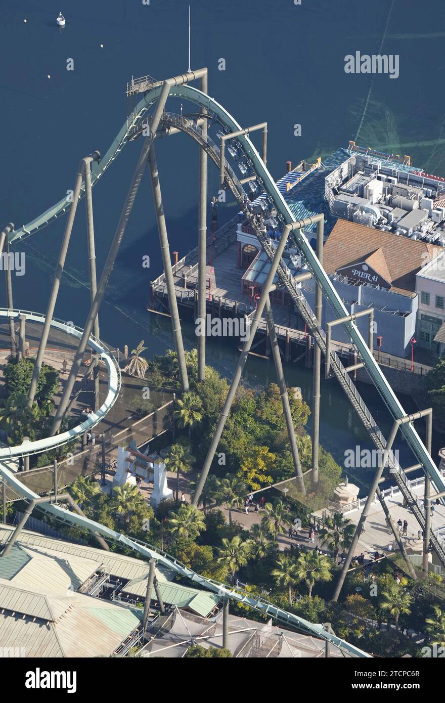 An aerial photo shows "The Flying Dinosaur" stopped at Universal ...
