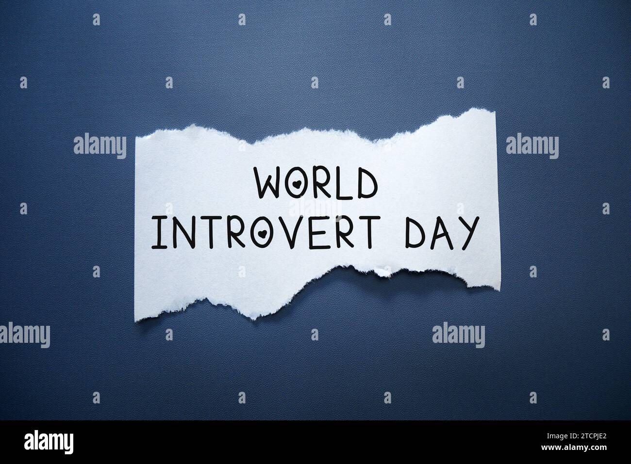 Torn note paper with introvert writing. World Introvert Day. January 2 ...