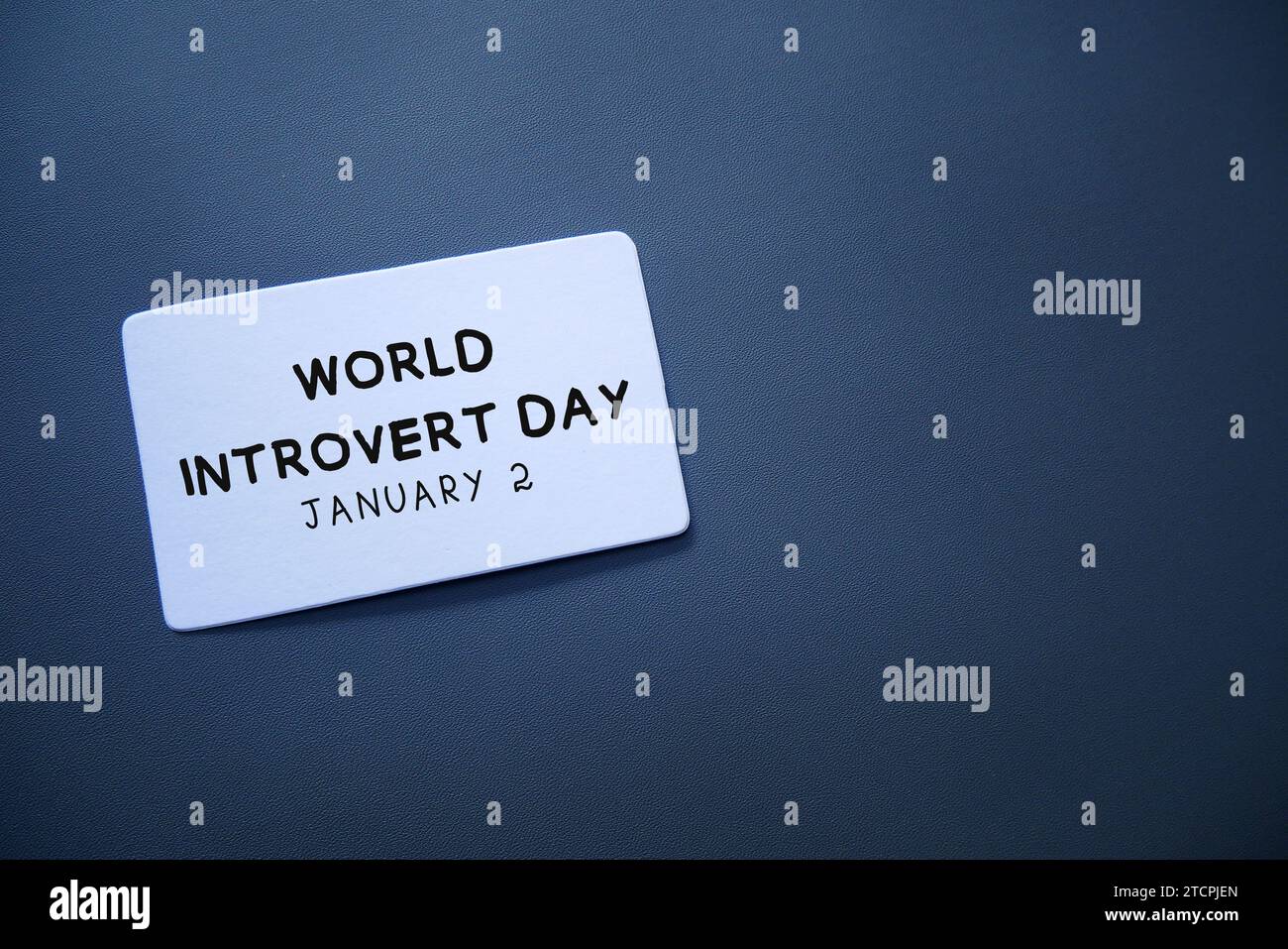 Torn note paper with introvert writing. World Introvert Day. January 2 ...