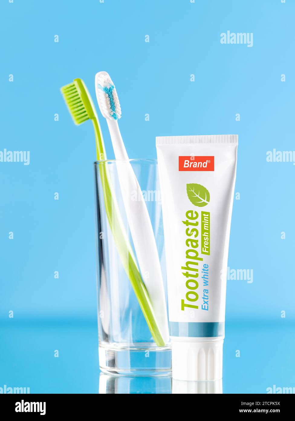 A clean and refreshing image featuring toothpaste and toothbrushes ...