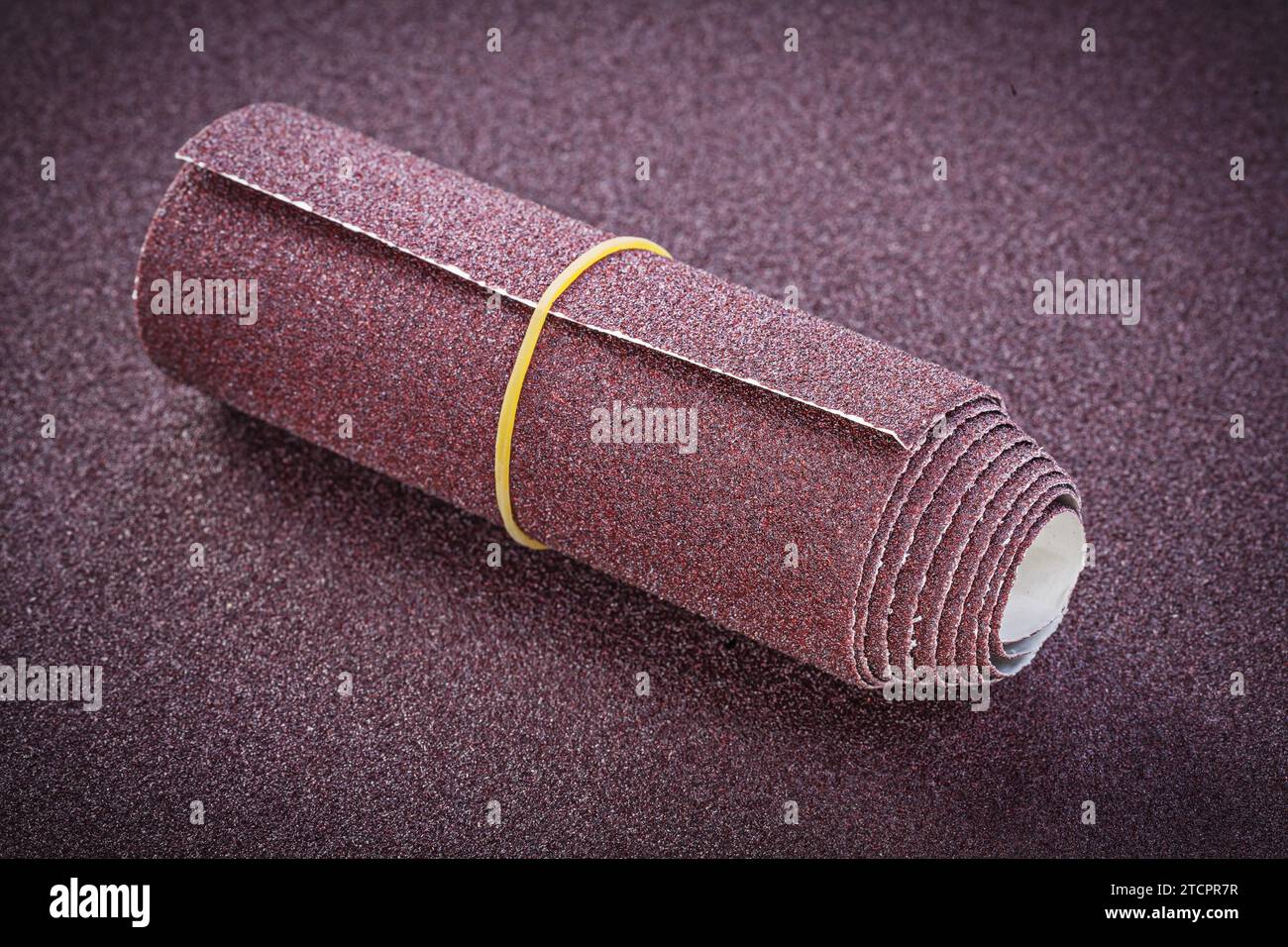 Rolled emery paper on polishing sheet Abrasive Stock Photo - Alamy