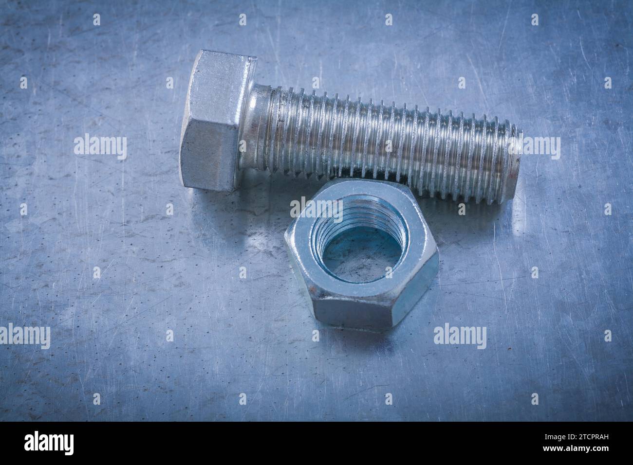 Stainless steel bolt on screw Nut metallic background Maintenance ...