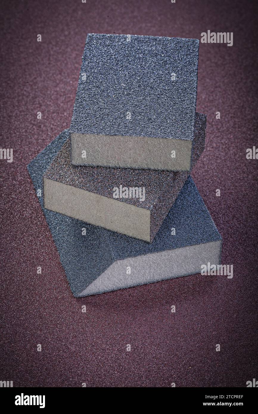 Sanding sponges on emery paper Vertical view Stock Photo - Alamy