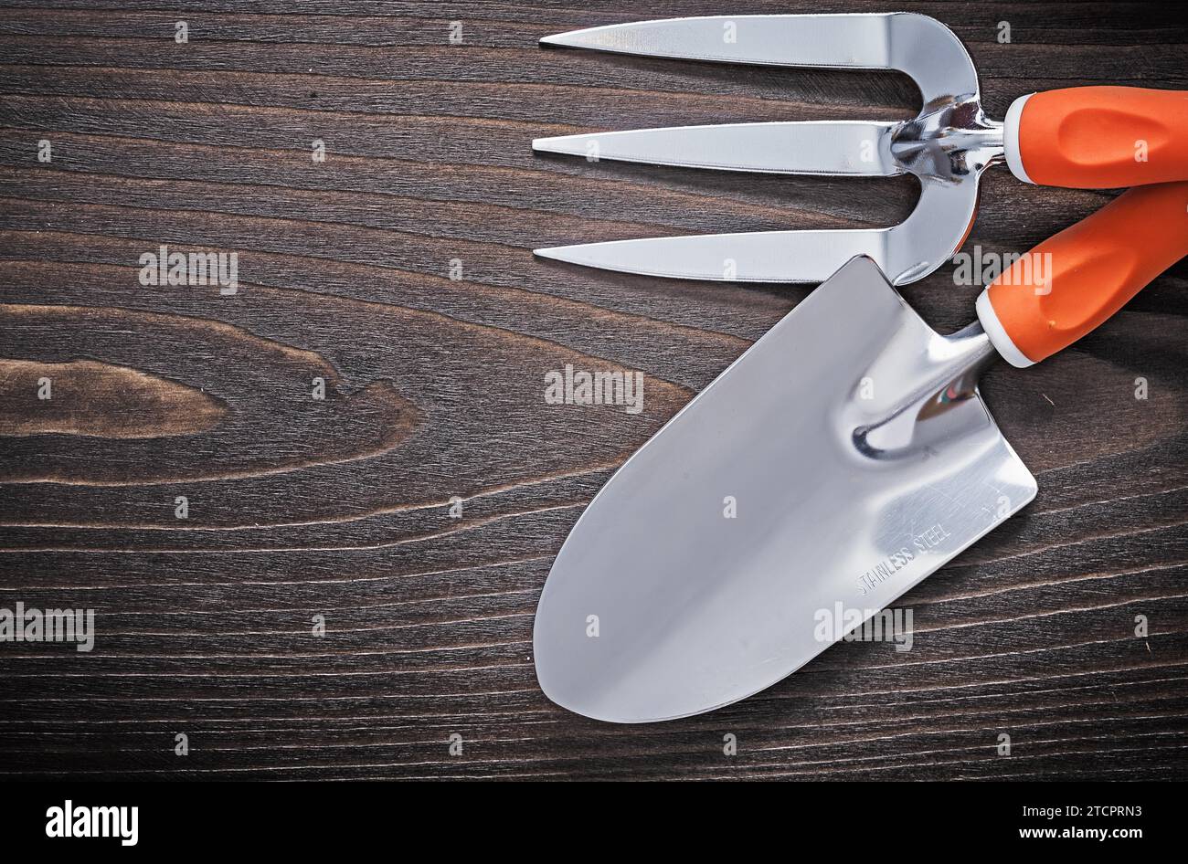 Hand metal spade and trowel fork with handles on vintage hardwood ...