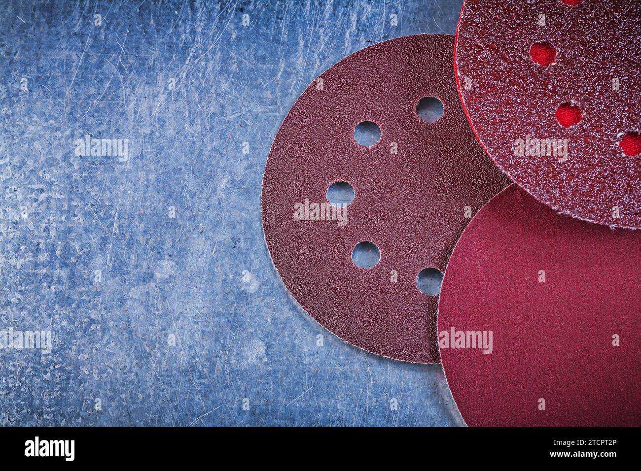 Grinding disc holder on scratched metallic background Copy space Stock ...