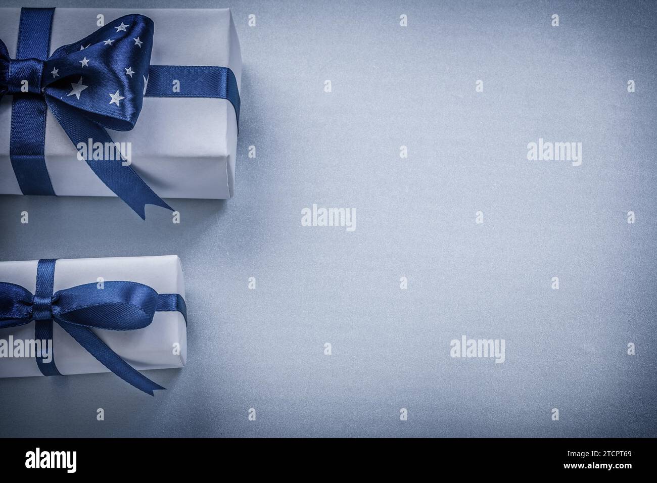 Assortment of gift boxes on blue background holiday concept Stock Photo ...