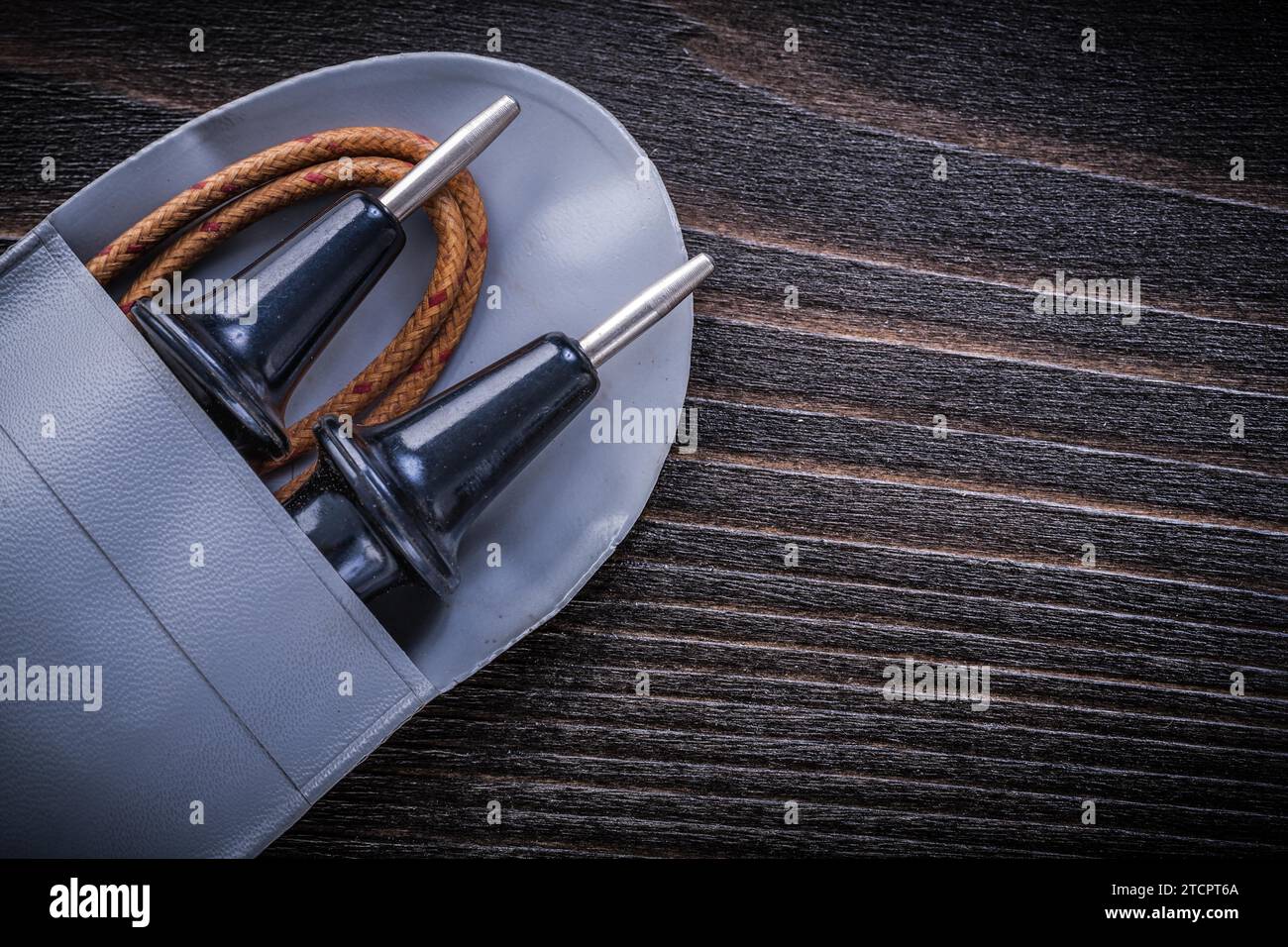 Ancient electrical testing device on a wooden background Electricity ...