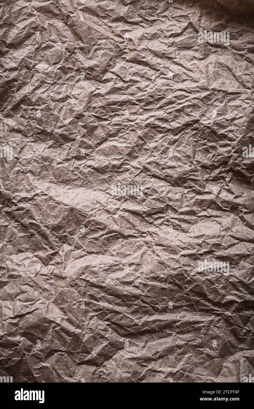 Ancient messy crumpled paper in vertical design Stock Photo - Alamy