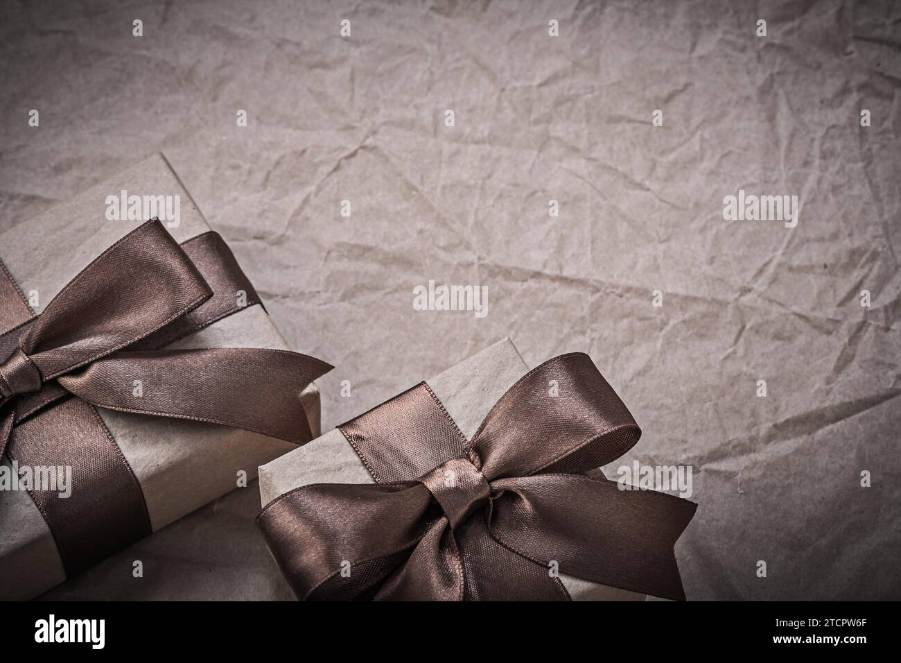 Gift boxes with tied ribbon on wrapping paper Celebration concept Stock ...