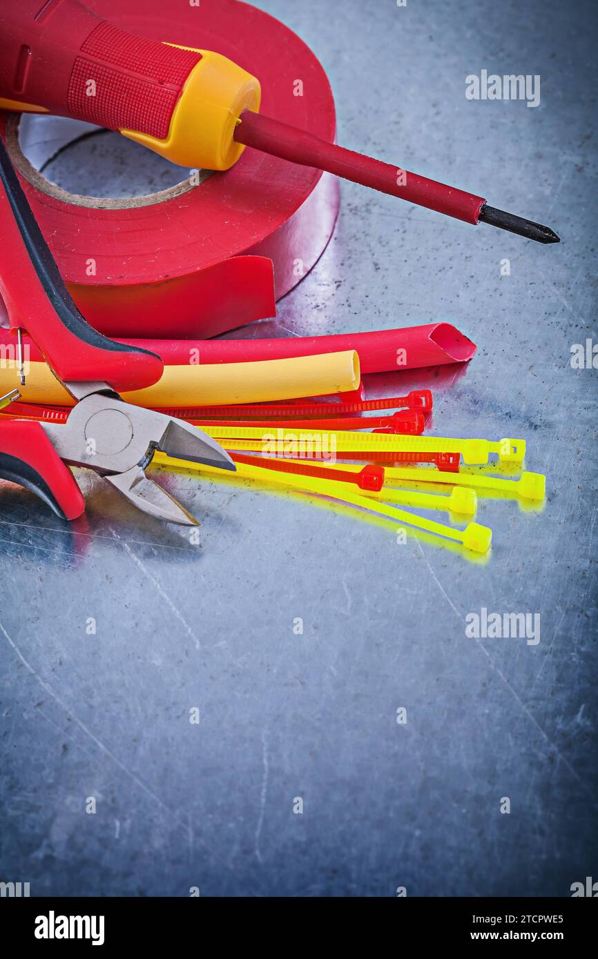 Insulating tape Electrical wires Plastic cable ties Screwdriver Cutting ...