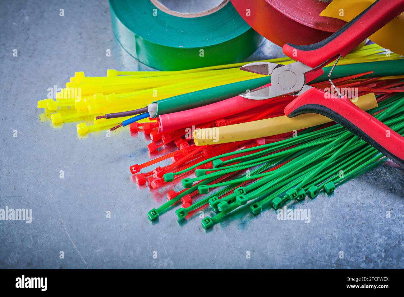 Insulating tapes Plastic cable ties Electrical cable pliers Stock Photo ...