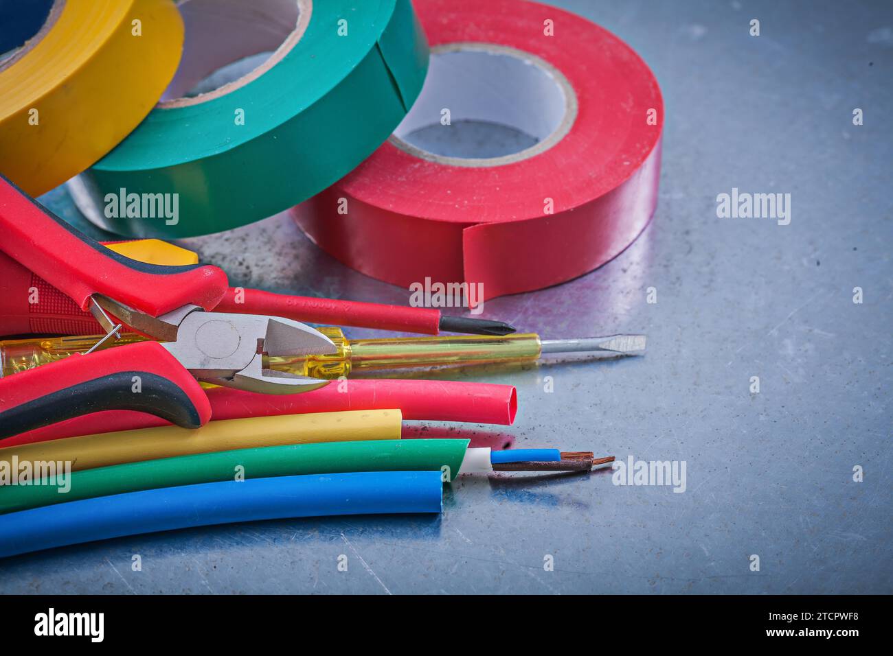 Insulating tapes Electrical cables insulated Screwdriver Cutting pliers ...