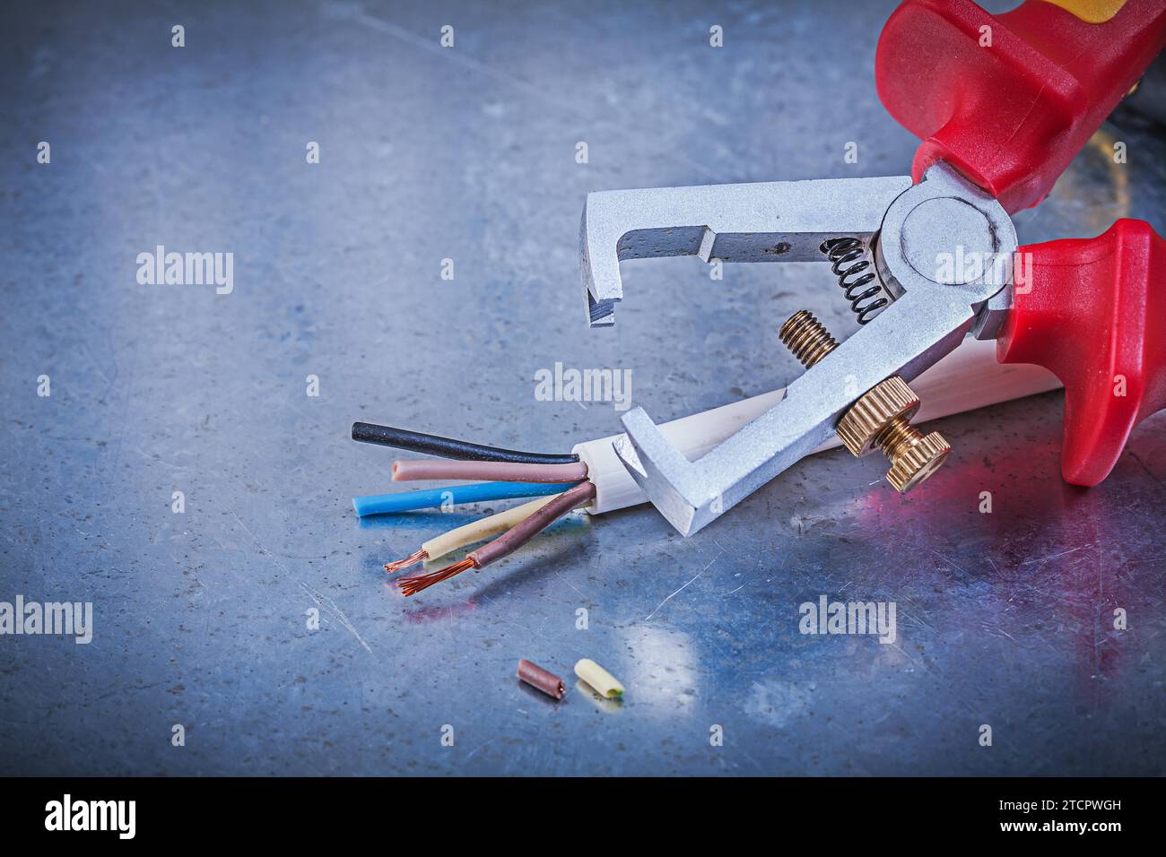 Wire stripper Electrical wires on scratched metallic background ...