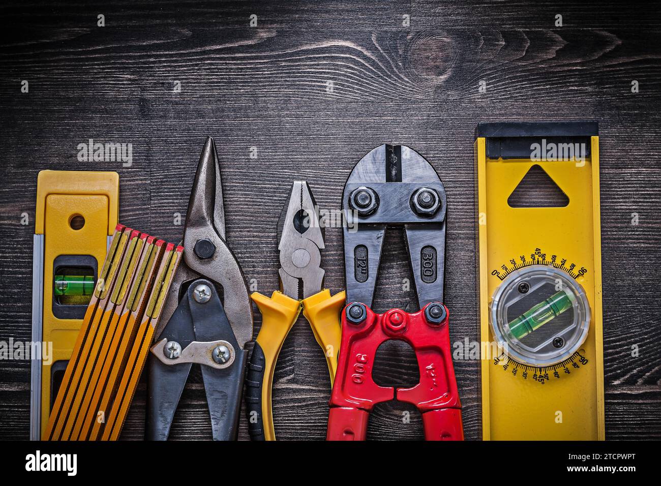 Metal tin snips Steel cutters Pliers Construction level Wood metre ...