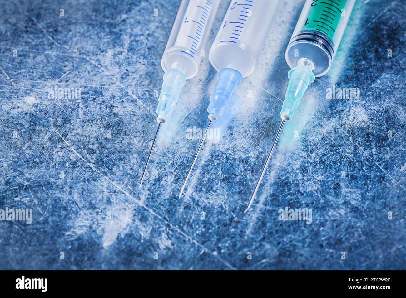 Medical concept for disposable hypodermic needles on a metallic ...