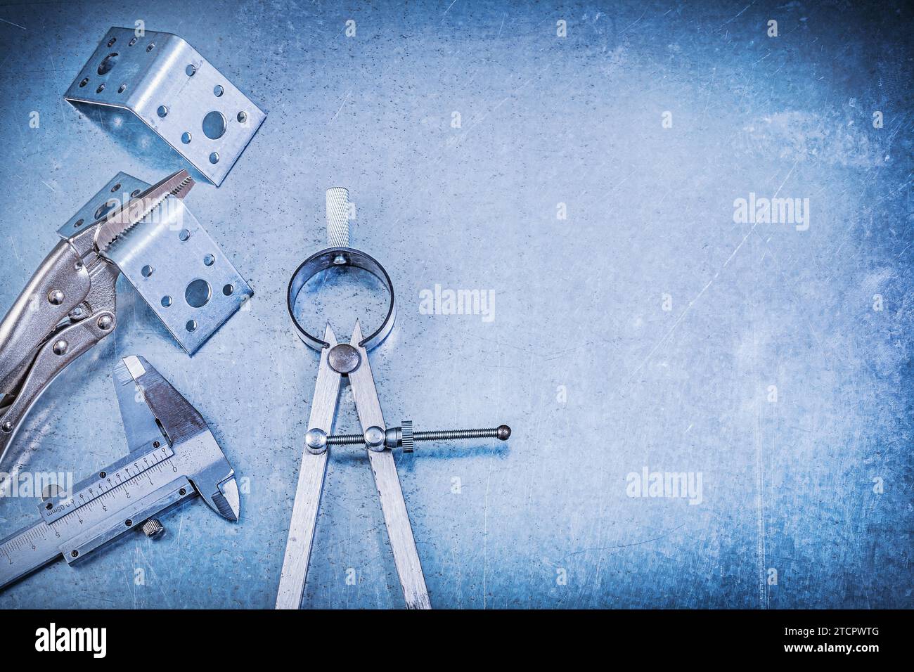 Metal locking pliers with jaws Sliding gauge Angle bar construction ...