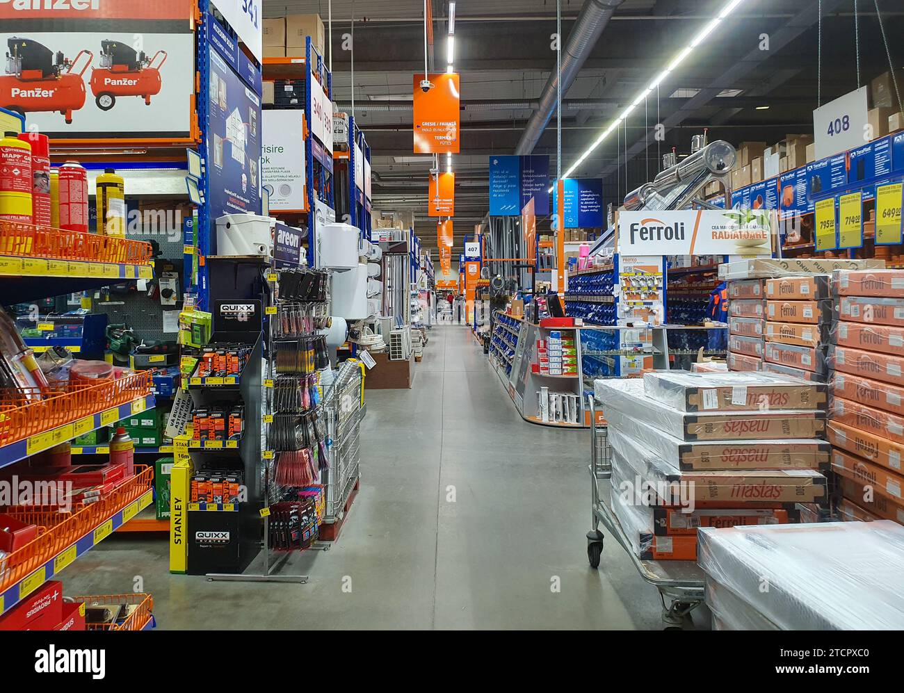 This stock photo features an interior shot of a retail store aisle ...