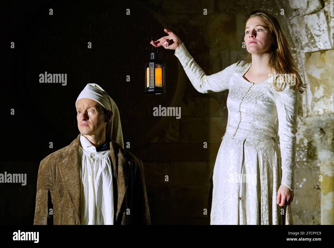 Actors from the London Touring Players perform the parts of Ebenezer ...