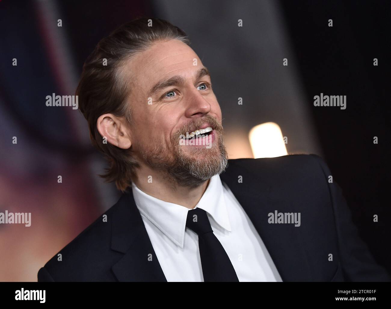 Hollywood, USA. 13th Dec, 2023. Charlie Hunnam arriving to the ‘Rebel ...