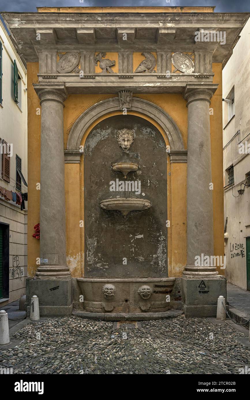 Historic fountain in the old town centre, Genoa, Italy Stock Photo - Alamy
