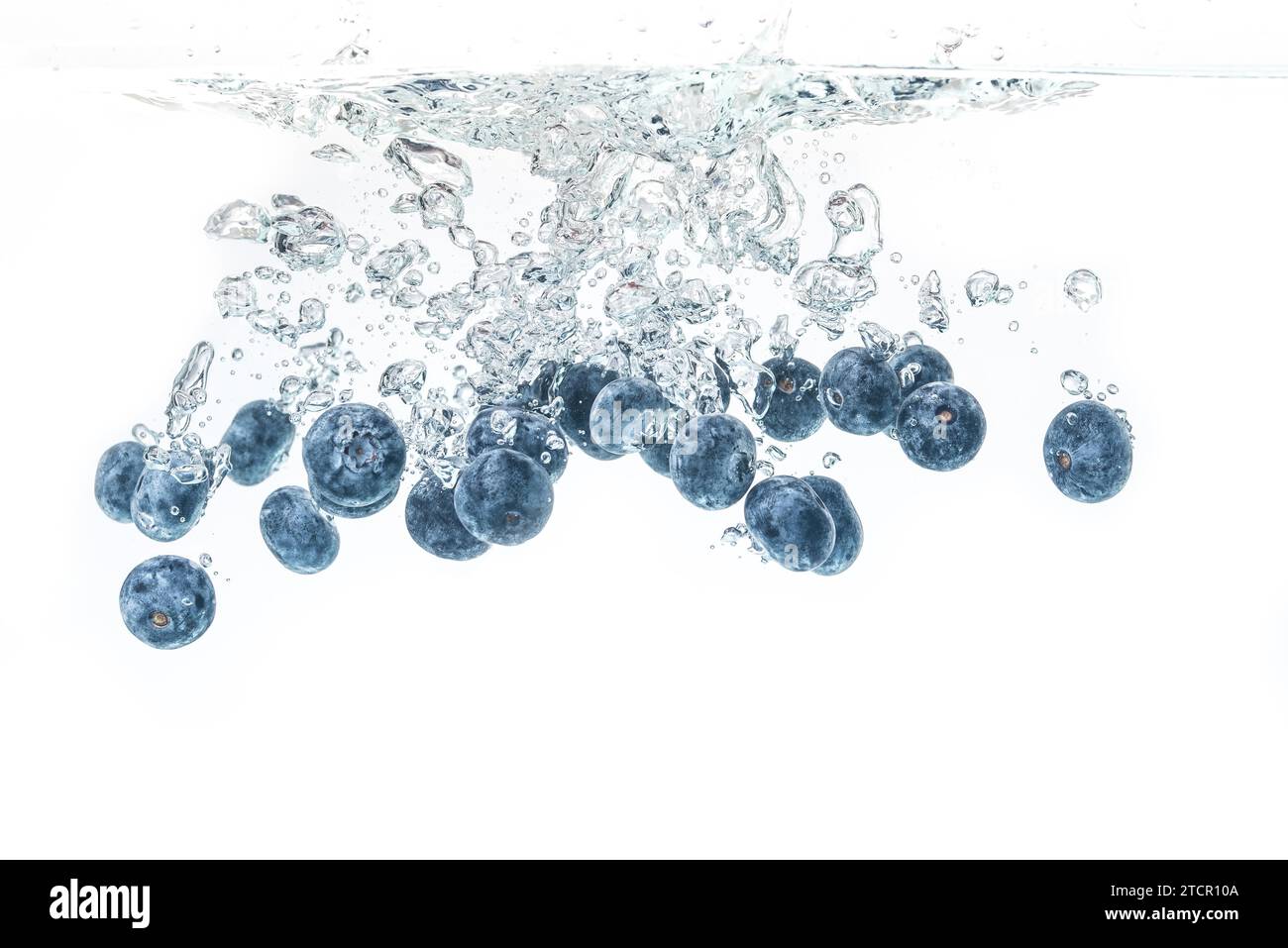 Blueberry?s splashing into crystal clear water with air bubbles Stock ...