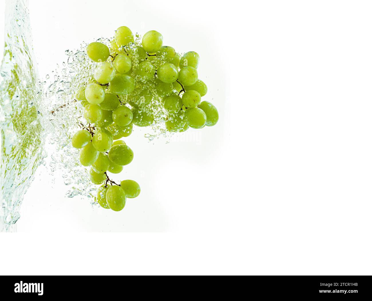 Bunch of white grapes sinking underwater with splash. Grape fruit theme ...