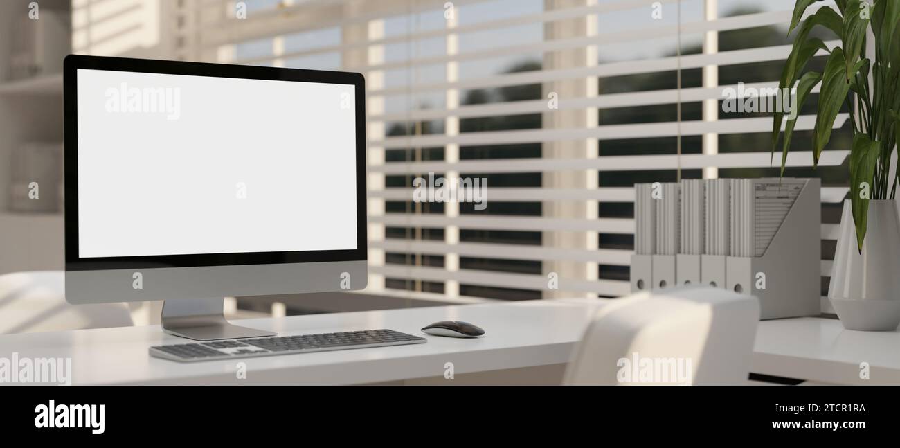 Modern white office with a computer white-screen mockup and office ...