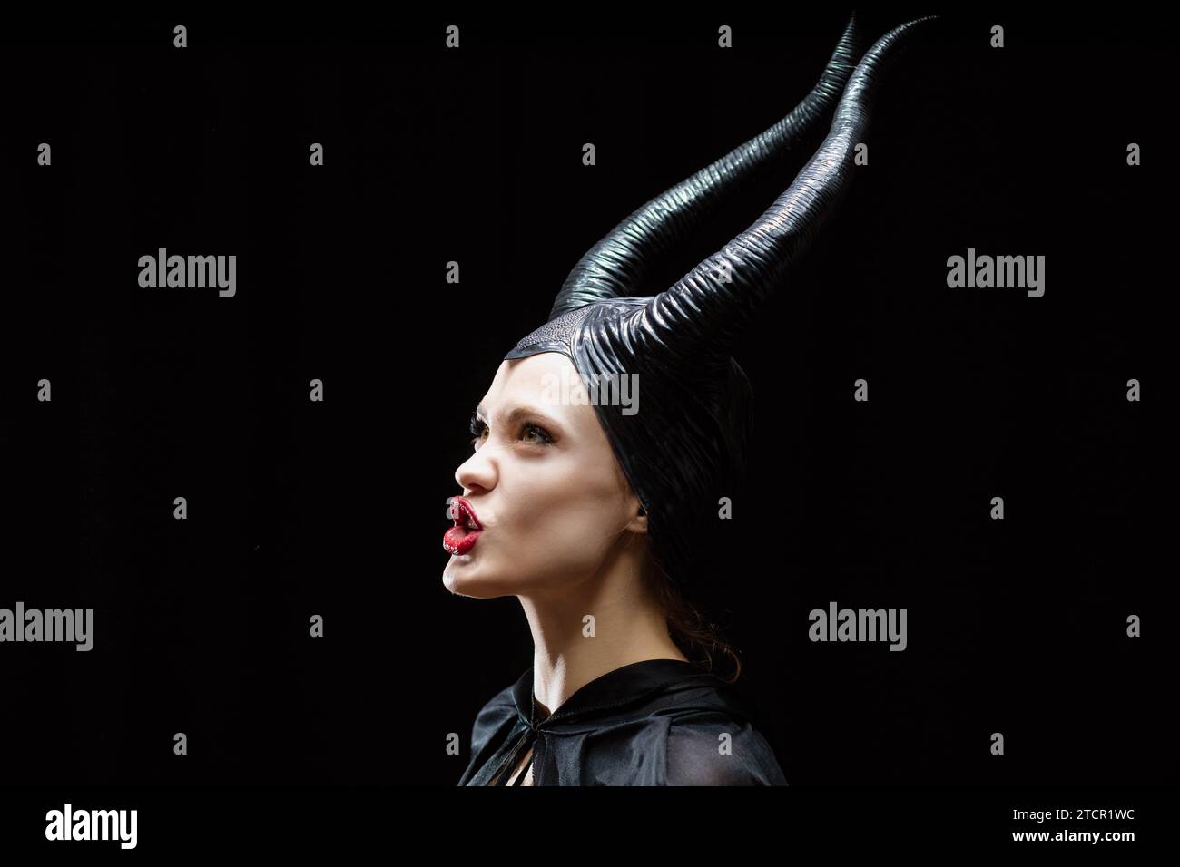 Fairy witch with devil horns, halloween costume. Beautiful magical ...