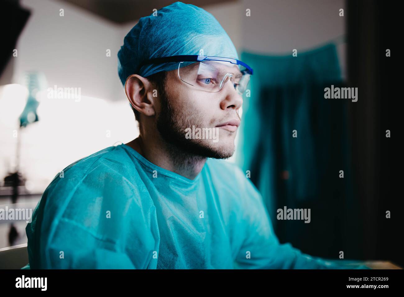 Portrait of a surgeon doctor in uniform at the medical office Stock ...