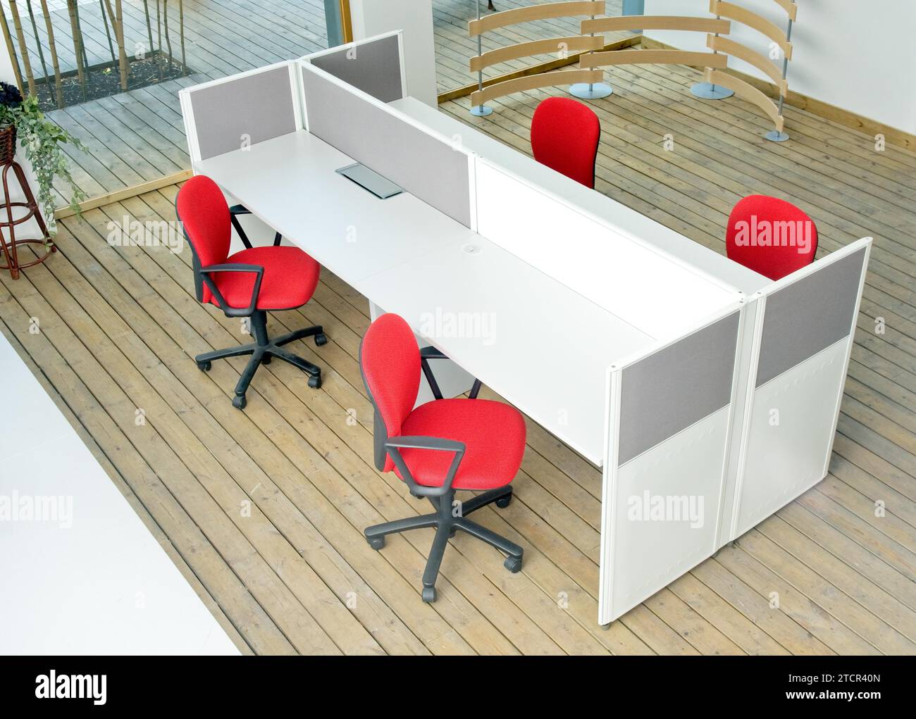 Office desks and red chairs cubicle set view from top over wood ...