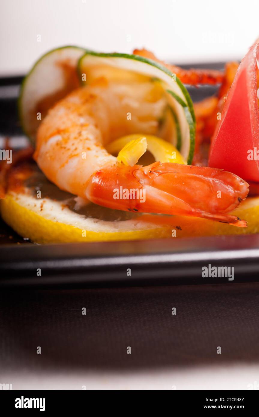 Colorful fresh prawn shrimps and vegetables appetizer snack antipasto ...