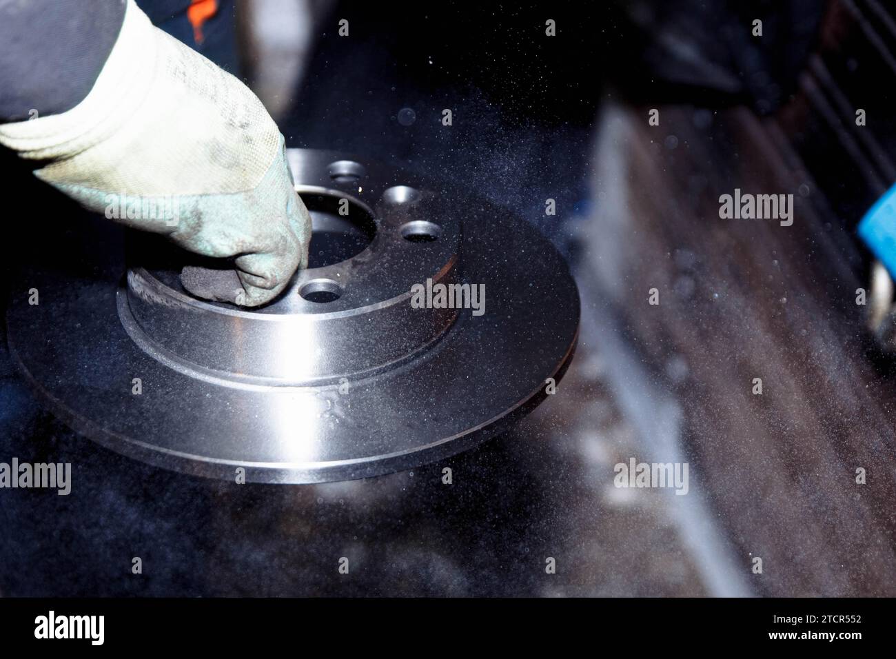 Cleaning a car brake disc Stock Photo - Alamy
