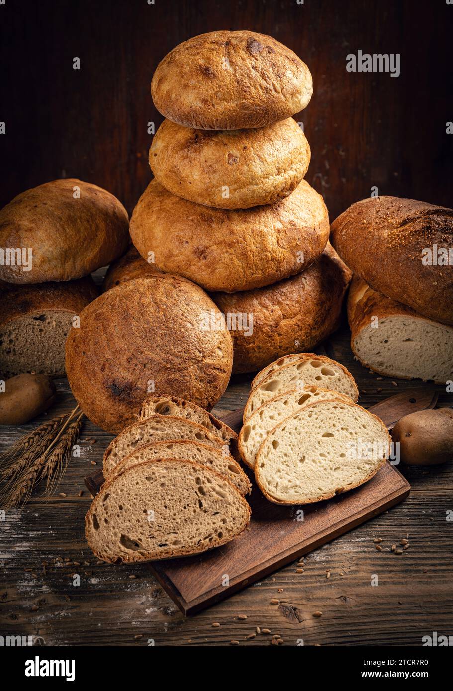 Bakery still life, gold rustic crusty loaves of bread Stock Photo - Alamy