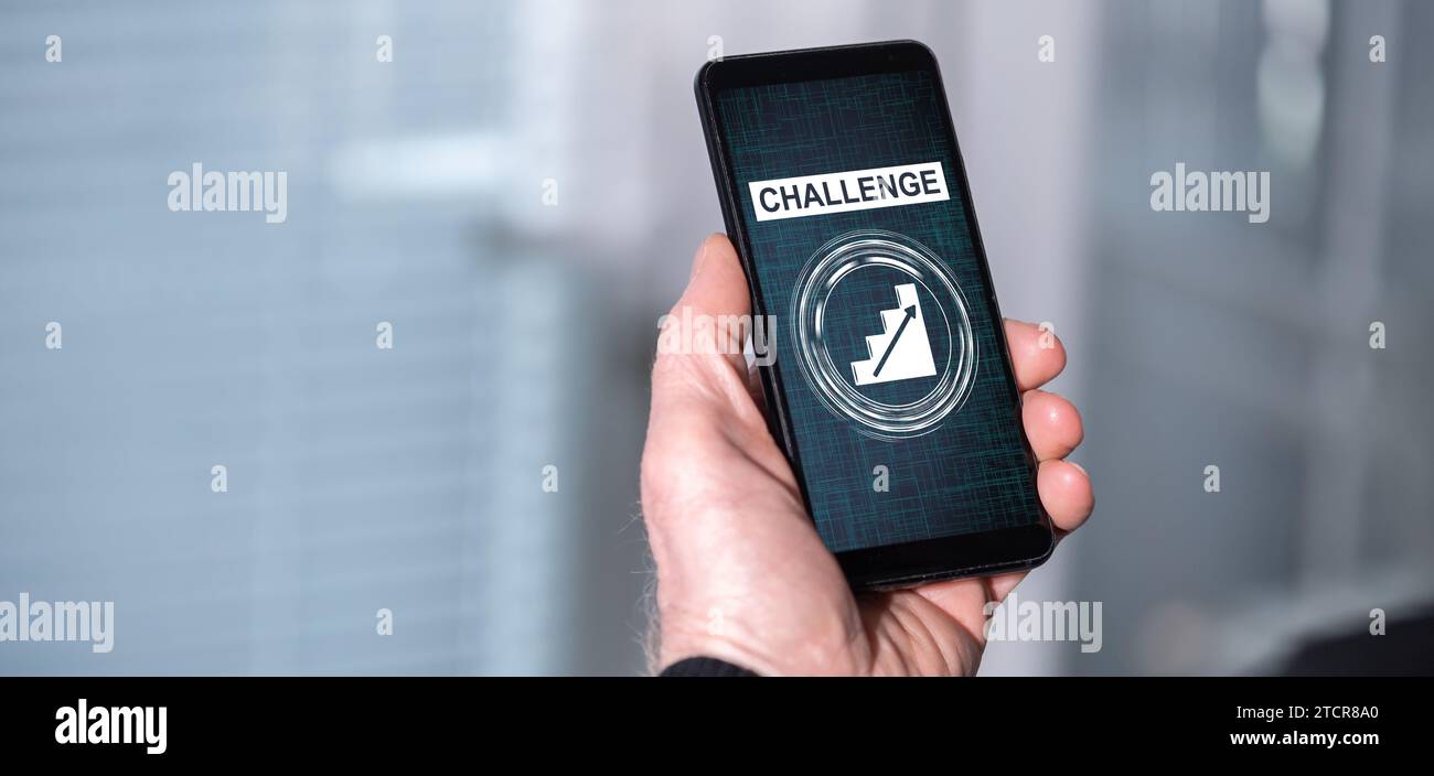 Smartphone screen displaying a challenge concept Stock Photo - Alamy