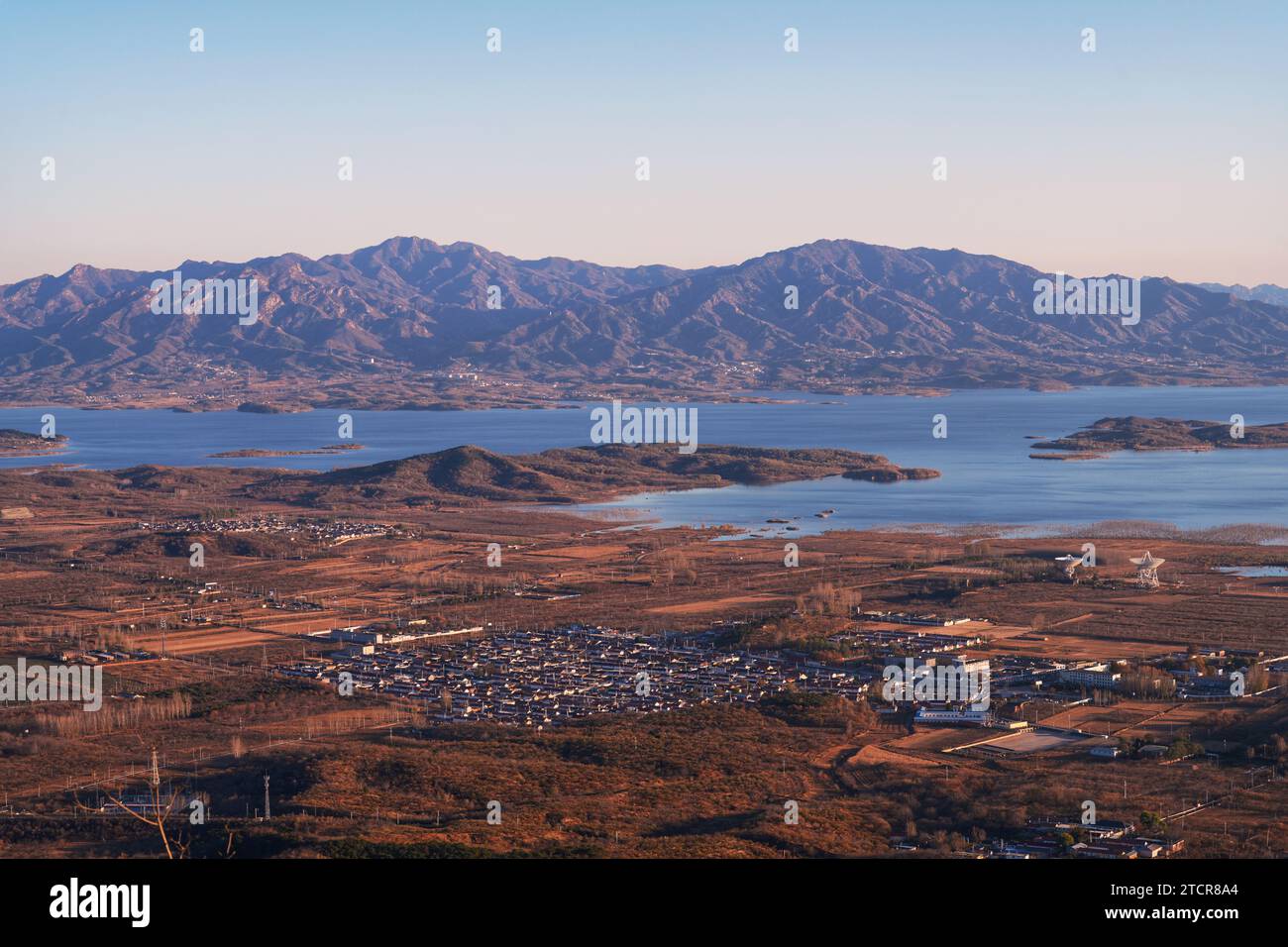 An aerial view of a small town on the lakeside su near Beijing, China ...