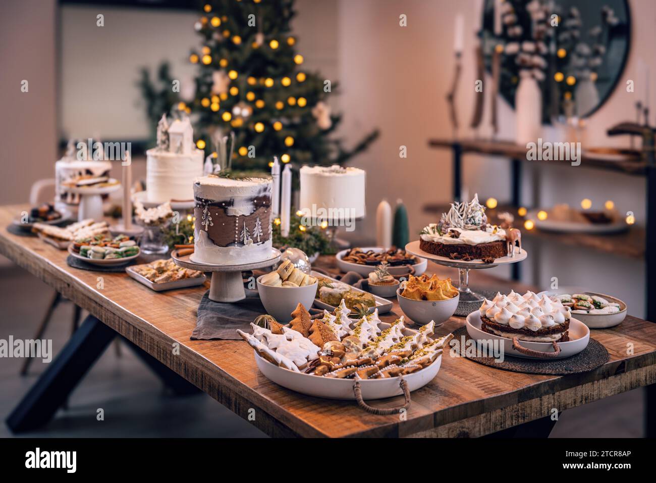 Christmas dessert table with sweets and holiday decorations Stock Photo ...