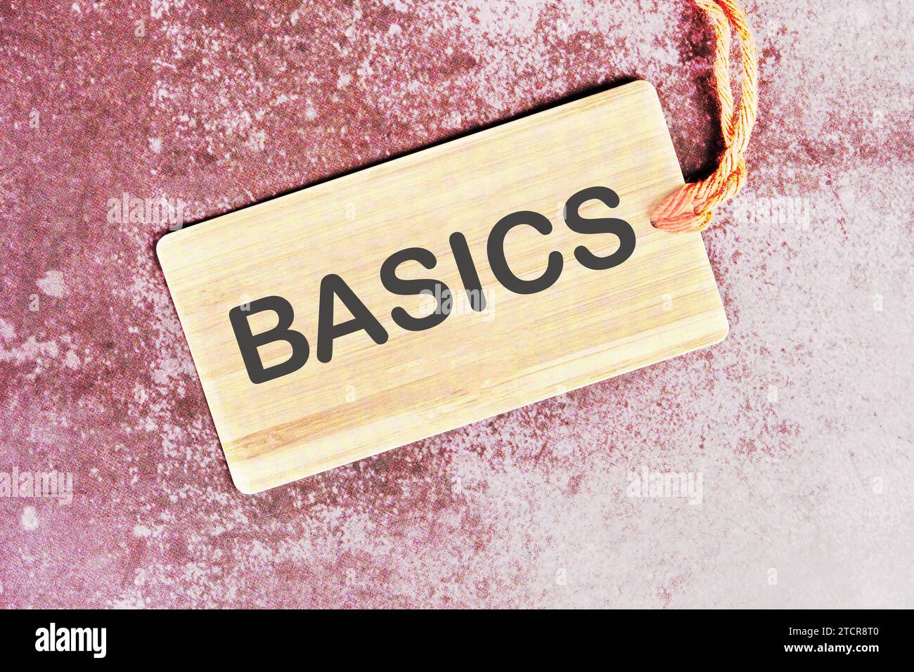 BASICS word written on a card with a rope on an abstract background ...