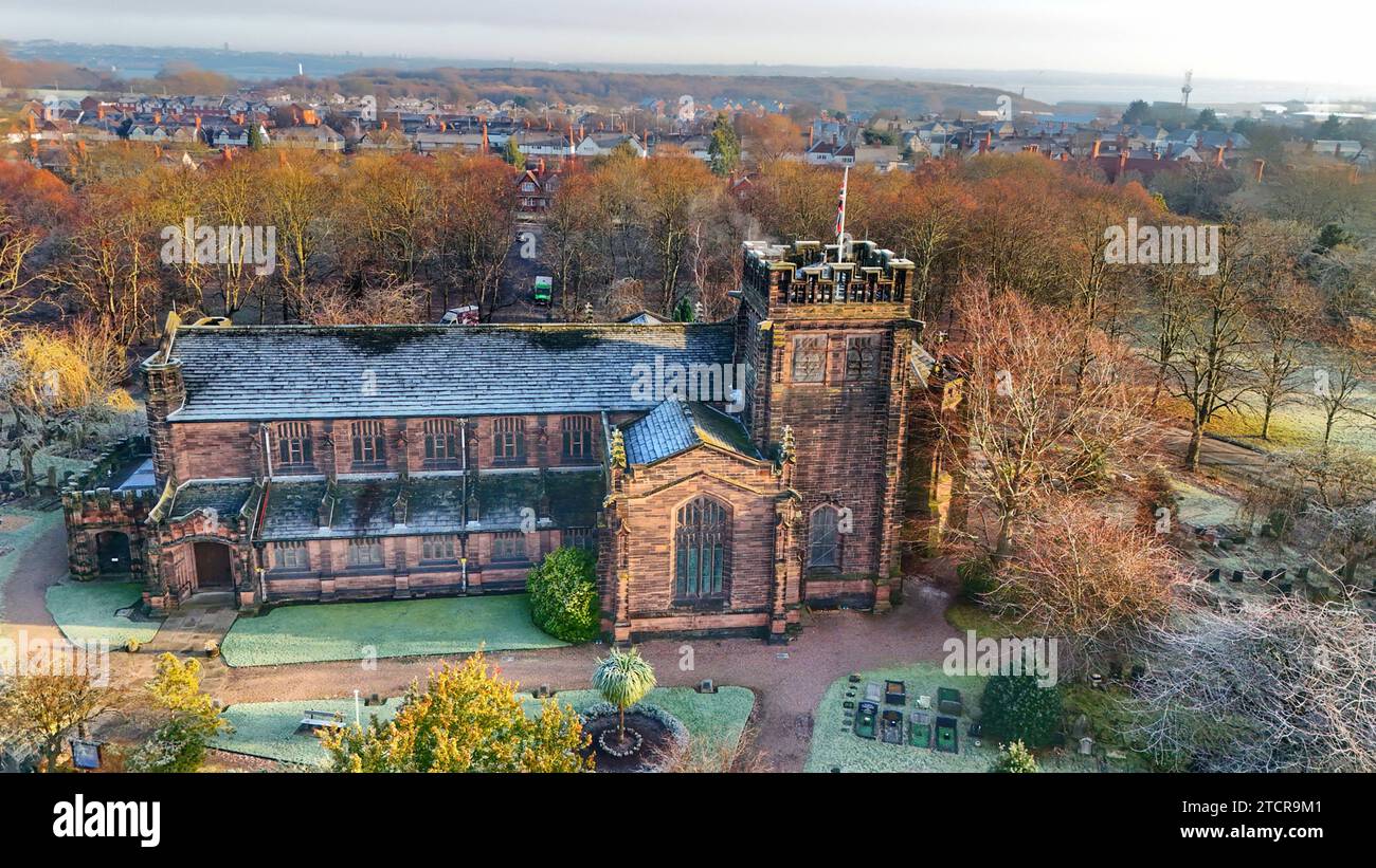 Aerial view of a traditional stone church with its bell tower in the ...