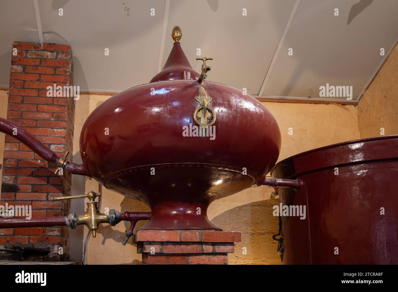Double distillation process of cognac spirit in Charentias copper still ...
