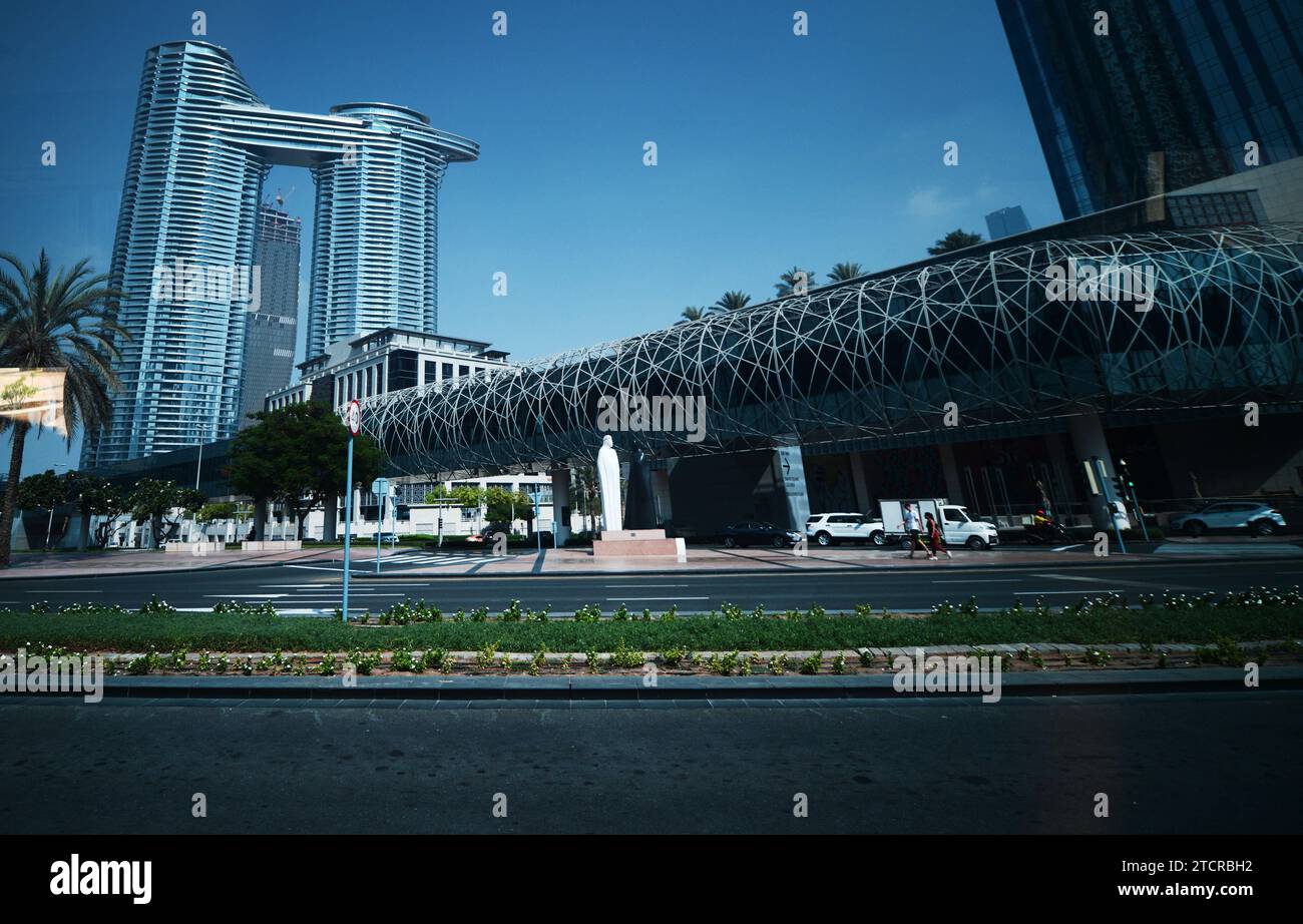 A modern pedestrian bridge connecting the Dubai mall and Emaar square ...